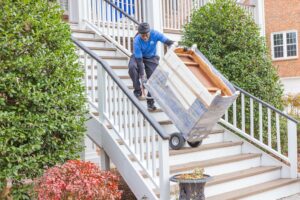 How to Move Heavy Furniture Up Stairs Safely - Two Twigs Moving